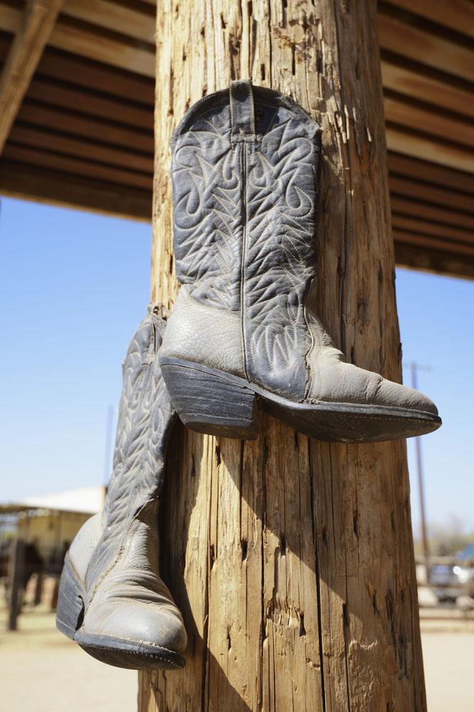 Cowboy Boots Hanging from Wall Mural – Wallmonkeys