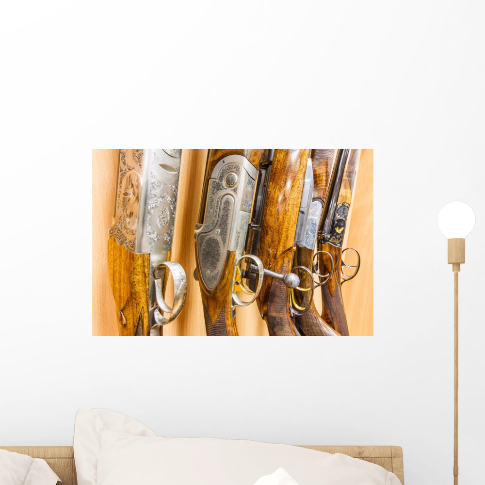 Close Up Of A Row Of Guns Displayed In Gun Shop Wall Decal 2 ...